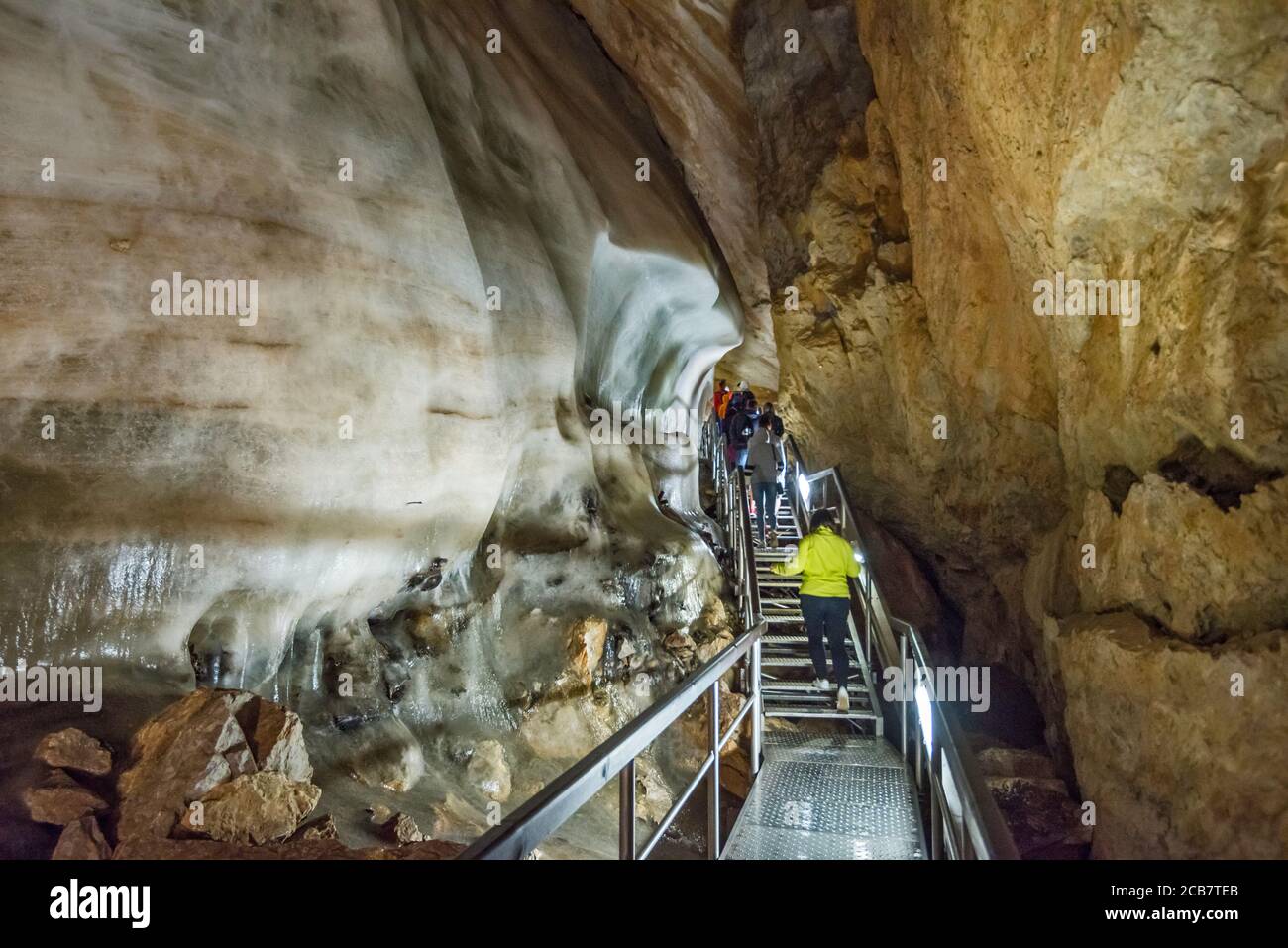 Visitors at underground glacier, Dobsinska Ice Cave, Slovak Paradise ...