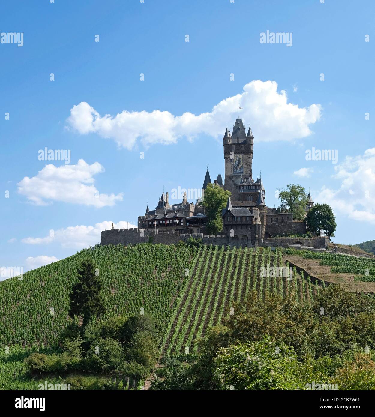 The "Reichsburg" castle of the city of Cochem in the Mosel region in ...