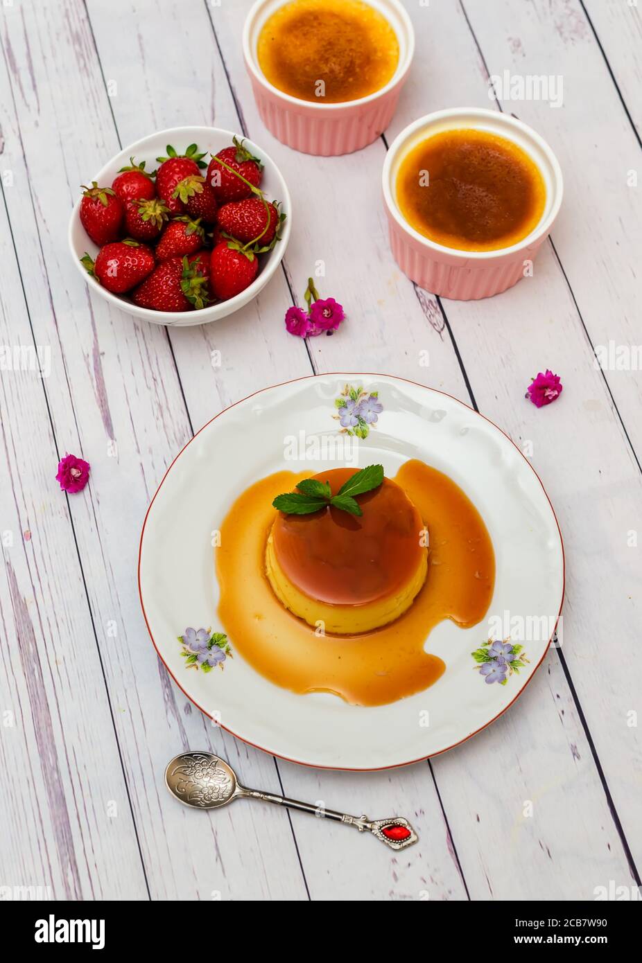 Custard creme caramel cooked slowly in the oven Stock Photo - Alamy