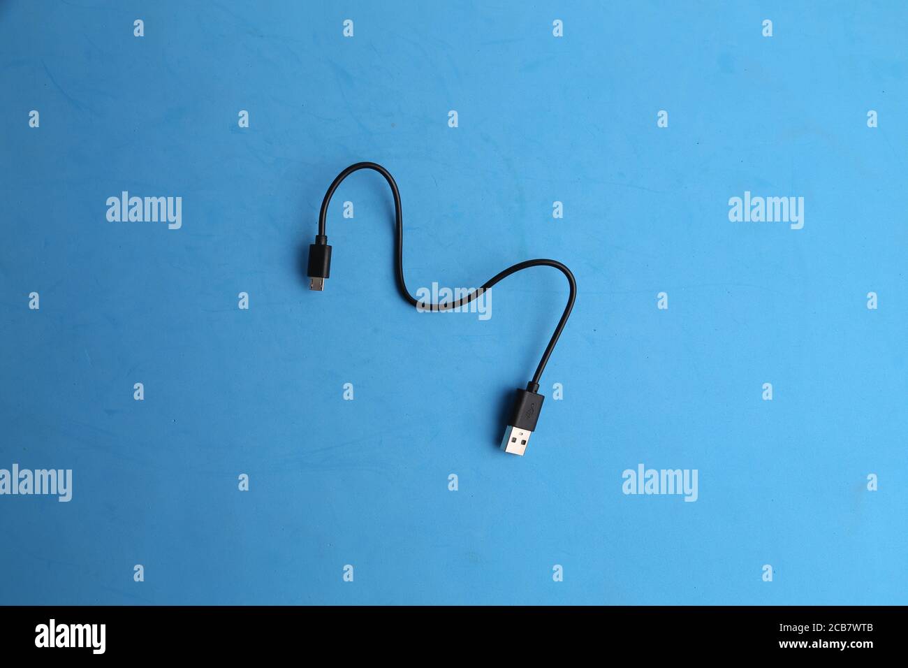 USB cable in color background Stock Photo - Alamy