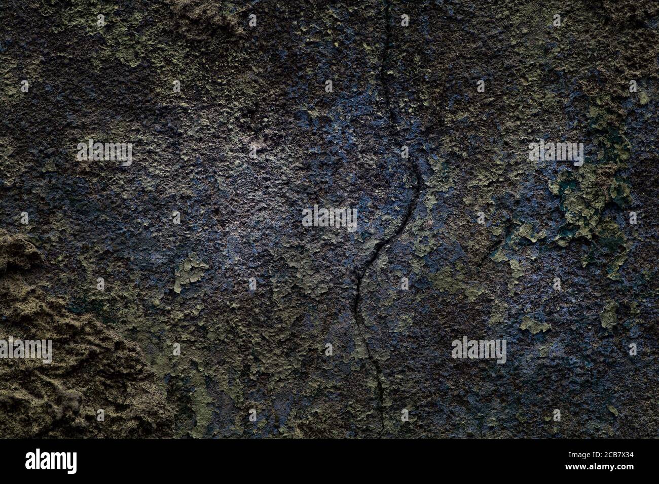 fantastic texture of a concrete wall with a crack and ripped plaster of ...