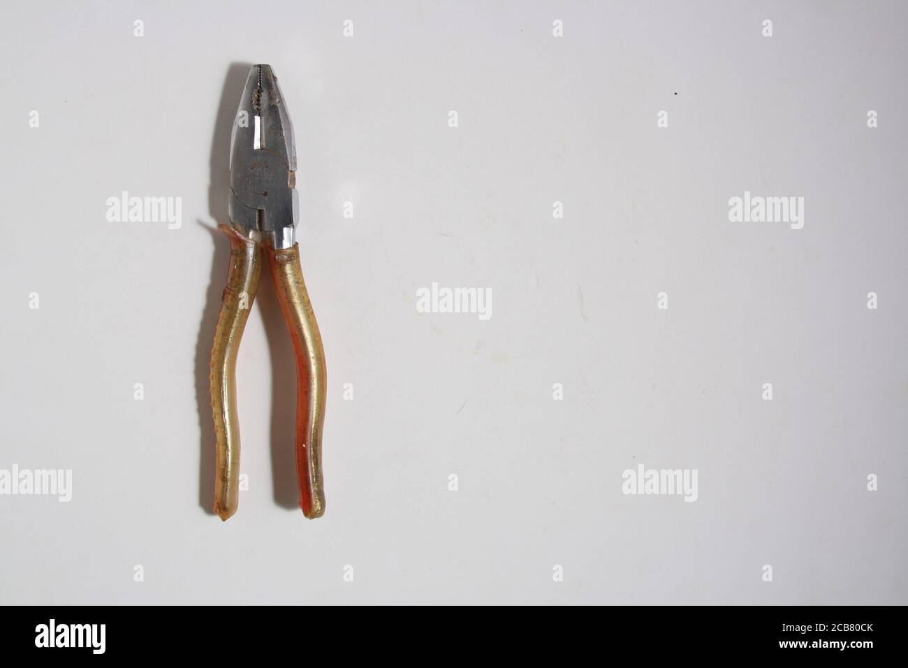 Top view of the old rusty pliers isolated on a white background Stock ...