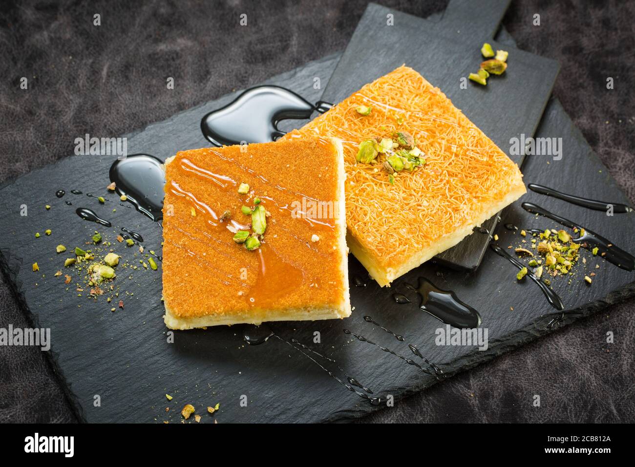 Traditional turkish dessert as known Kunefe or Kunafah or Kunafeh or ...