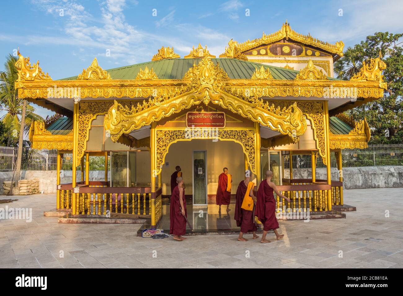Yangon, Myanmar - December 18th 2017: Monks at the Dhammazedi Stone ...