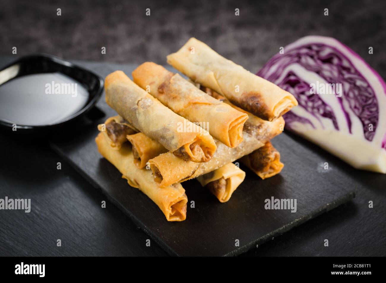 Turkish style stuffed filo dough rolls served along Stock Photo - Alamy