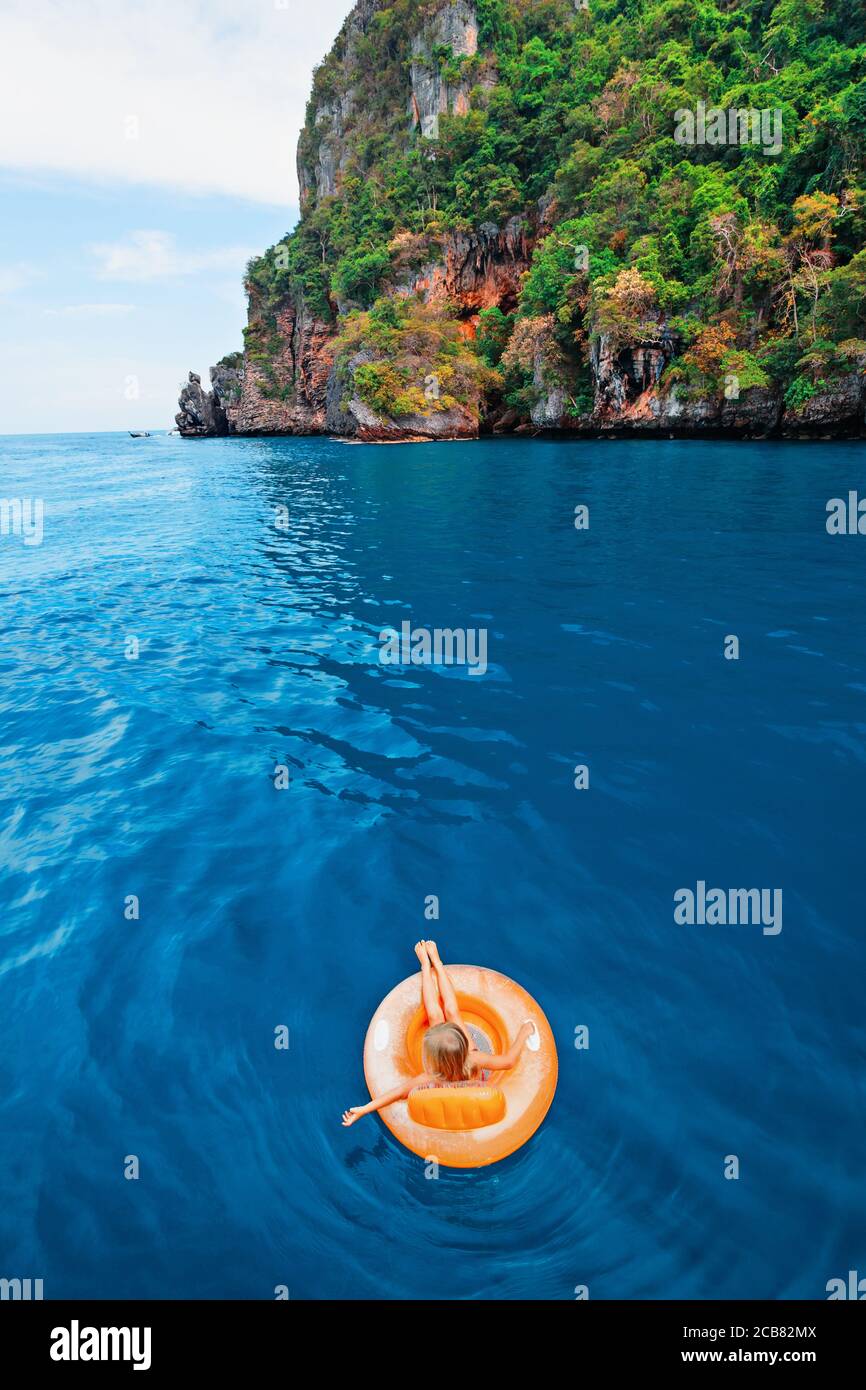 Kids floating sea hi-res stock photography and images - Alamy