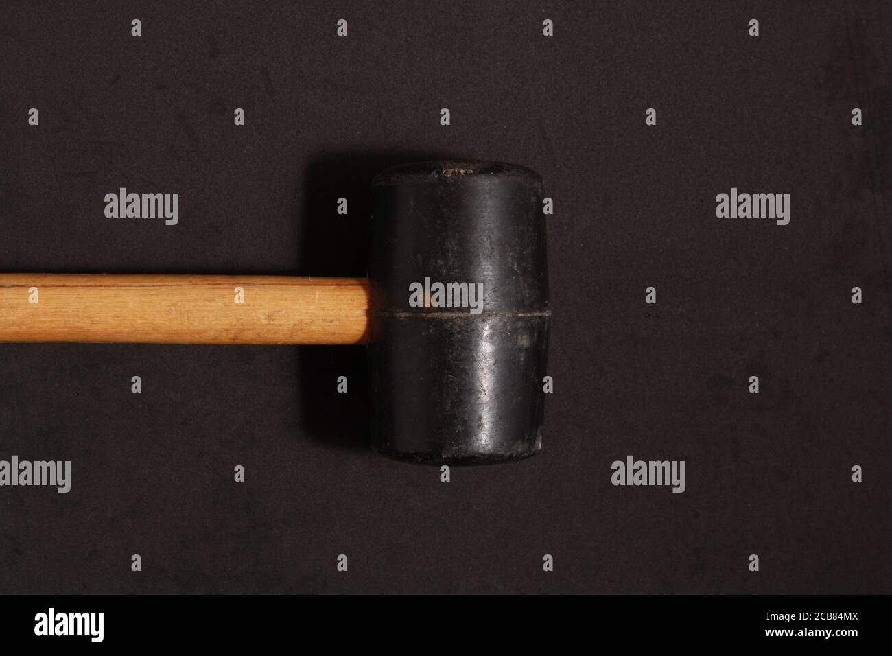 Top view of a rubber mallet isolated on a black background Stock Photo ...