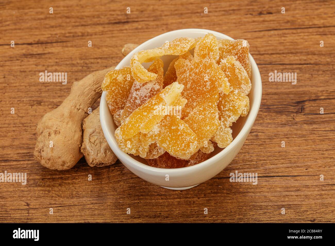 Dry sweet ginger snack in the bowl Stock Photo - Alamy