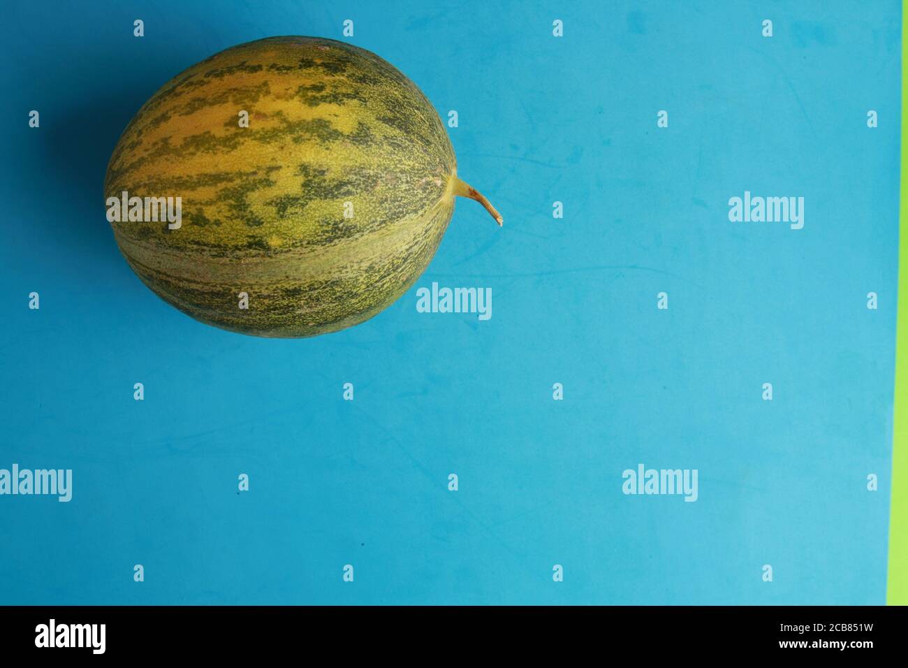 Delicious melon grown in Spain on colorful background Stock Photo - Alamy