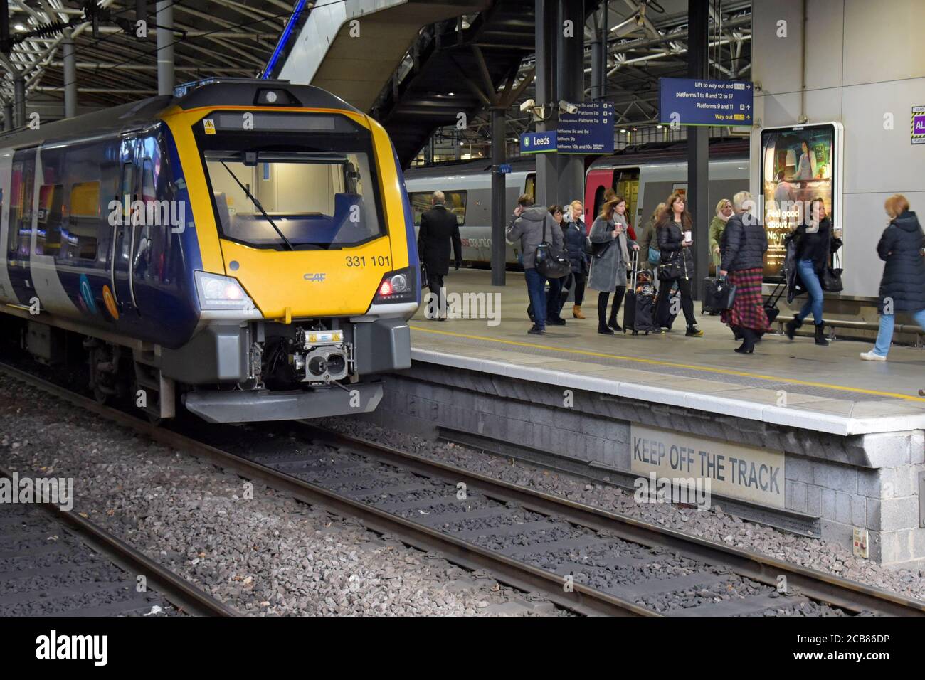 Passengers getting on and off of a New Northern Trains CAF Civity 331 ...