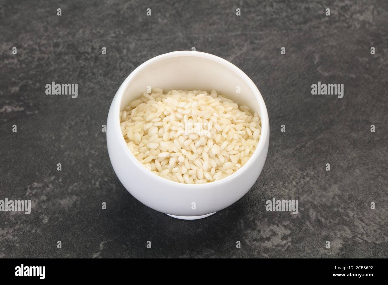 Raw Arborio rice for Italian risotto Stock Photo - Alamy