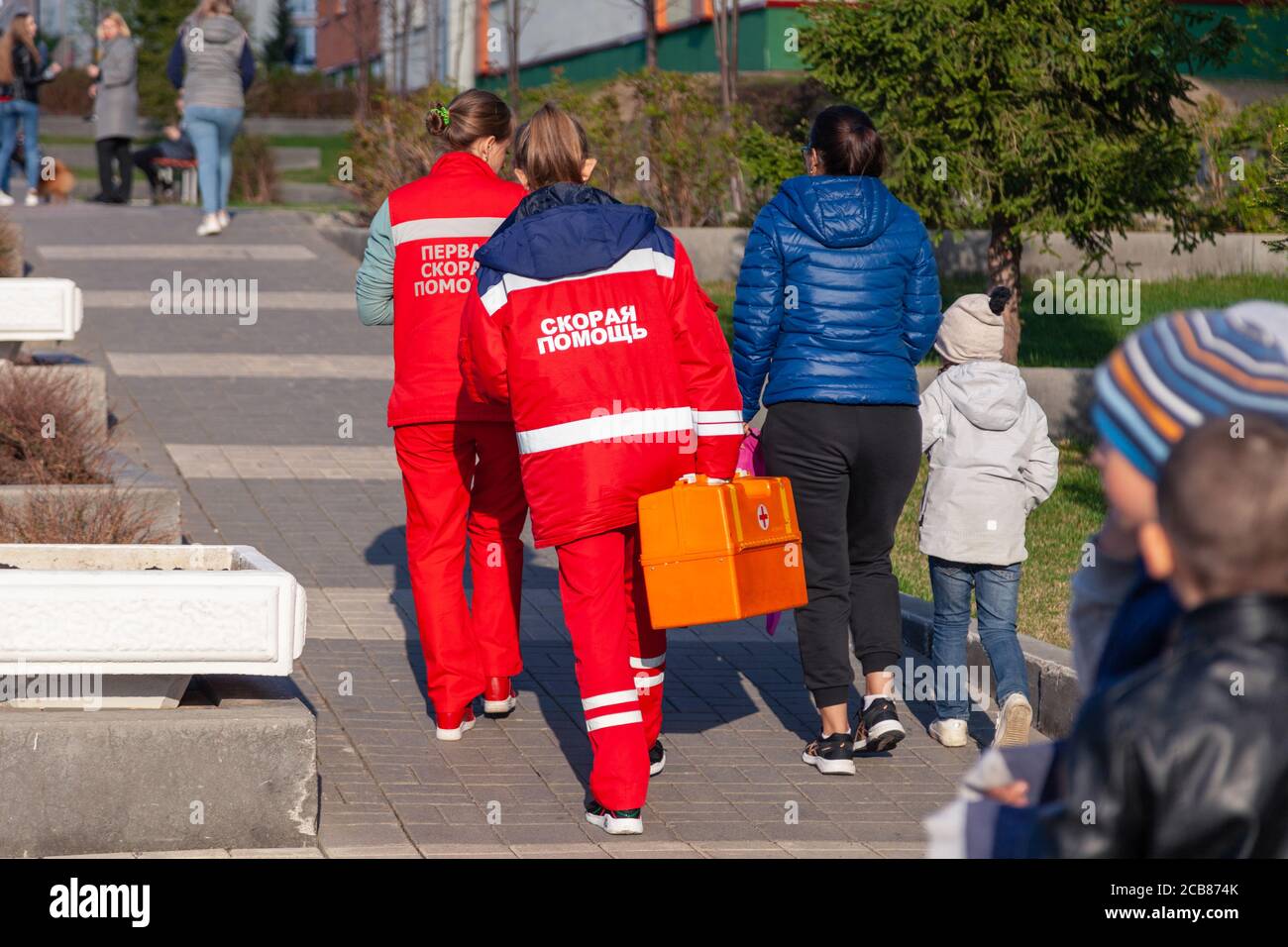 Russia Kemerovo 2019-05-21 Ambulance team of a woman in a red uniform ...