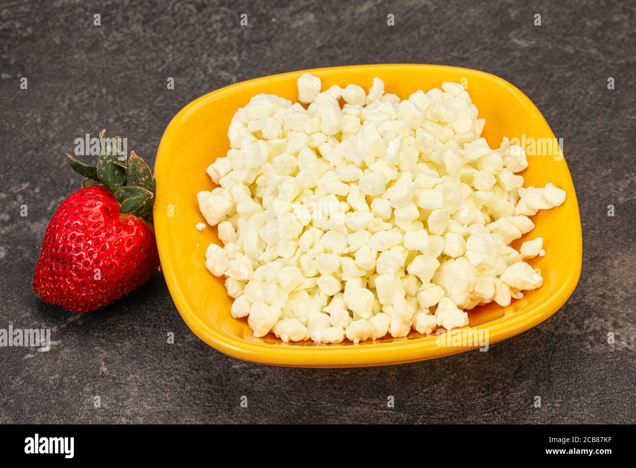 Dietary food - grain cottage cheese in the bowl Stock Photo - Alamy