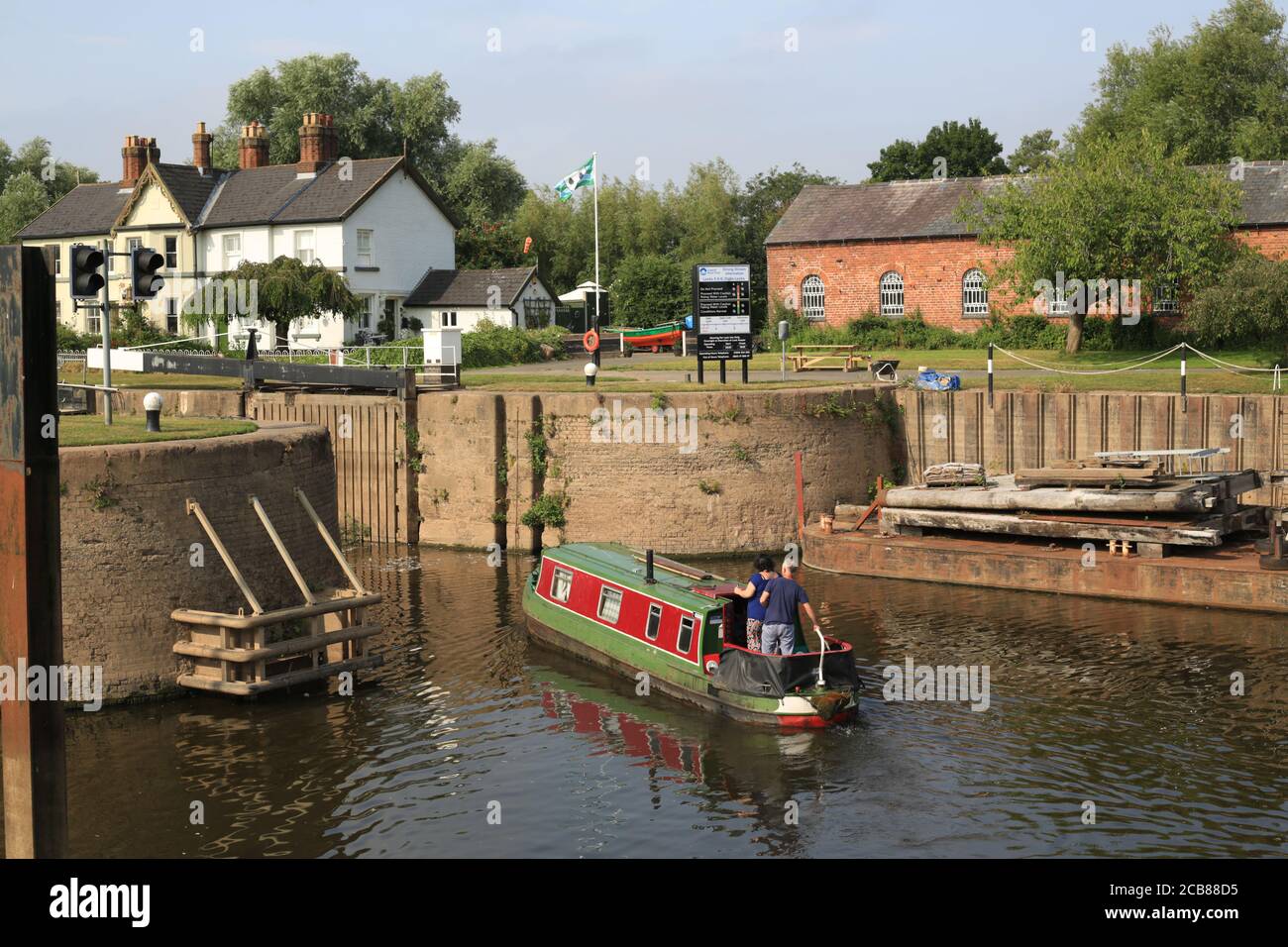 A narrowboat entering Diglis lock on the river Severn in Worcester, Worcestershire, England, UK ...