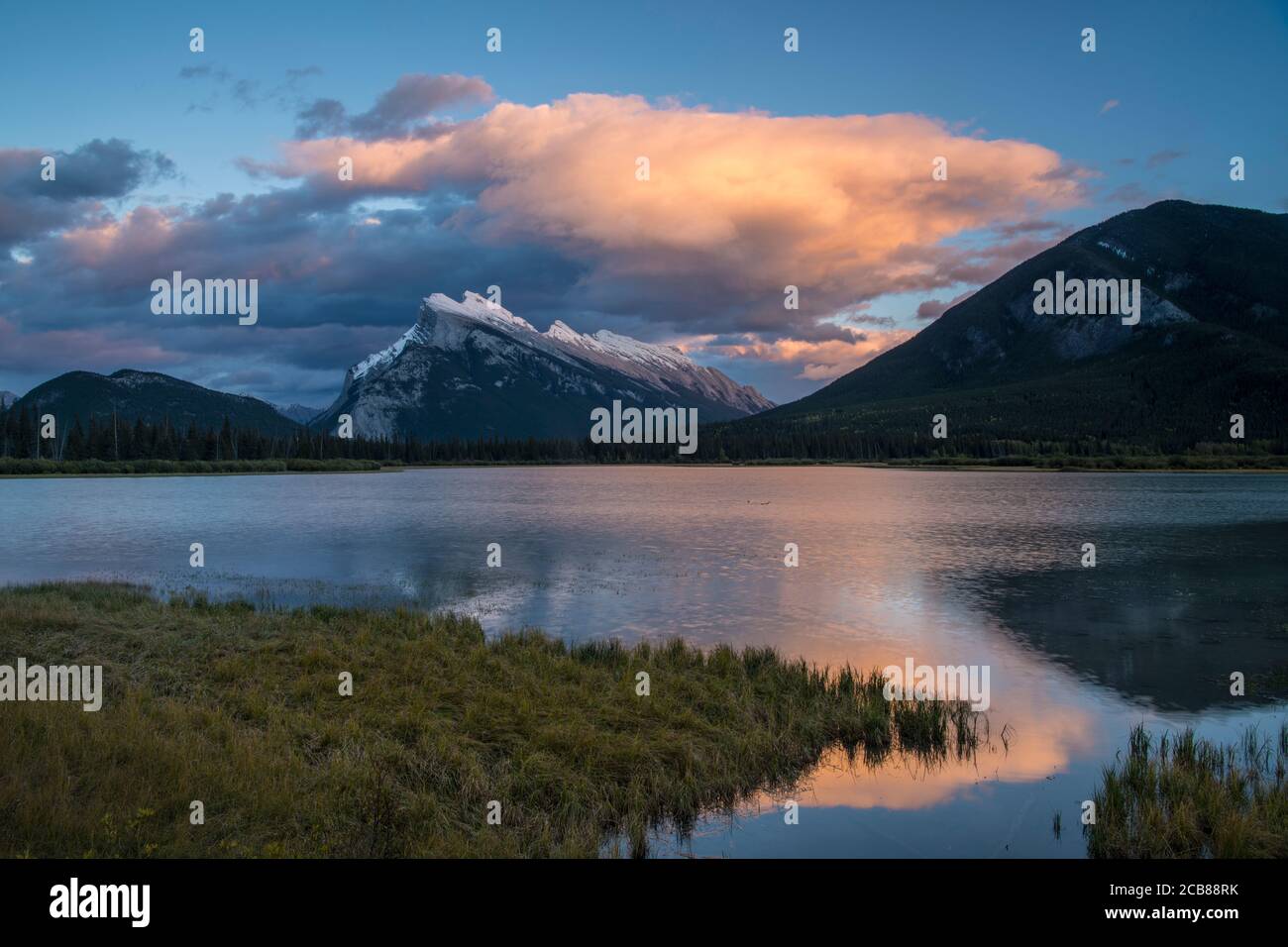 Evening skies over Mt. Rundle reflected in Vermilion Lakes, Banff ...