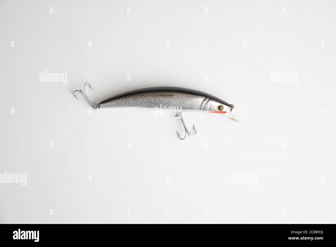 Fishing lure isolated on white background Stock Photo - Alamy