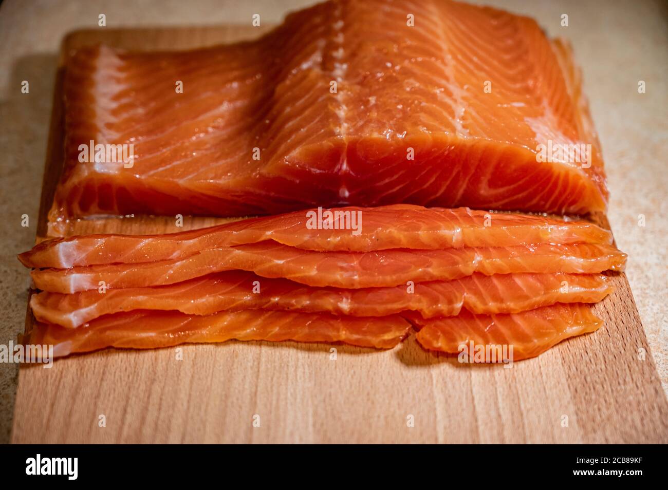 Close-up slices of fresh salmon fillet. salmon fillet on a cutting ...
