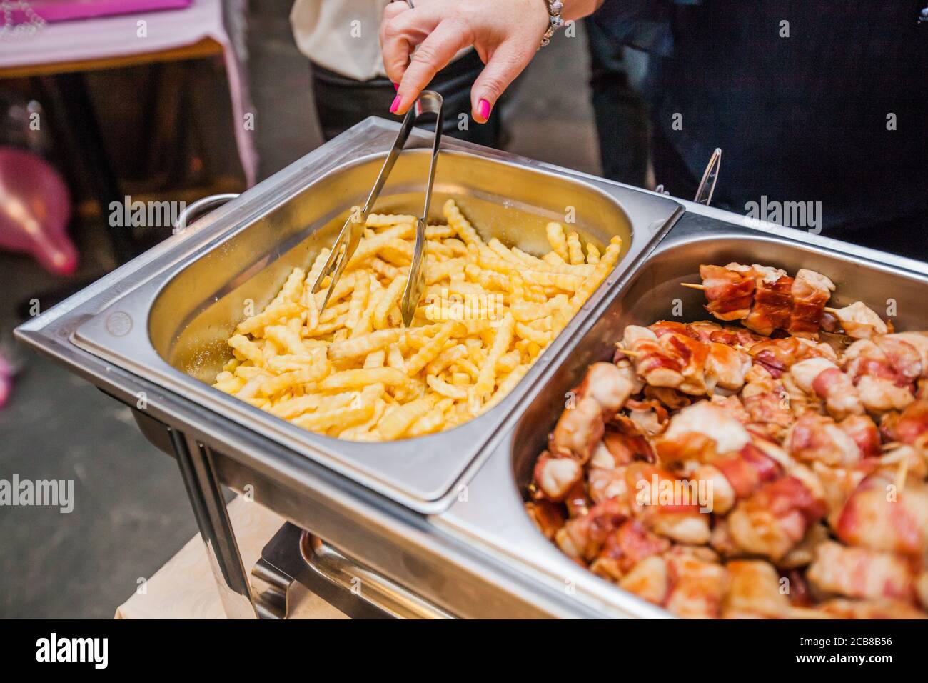 French fries served in event dish Stock Photo - Alamy