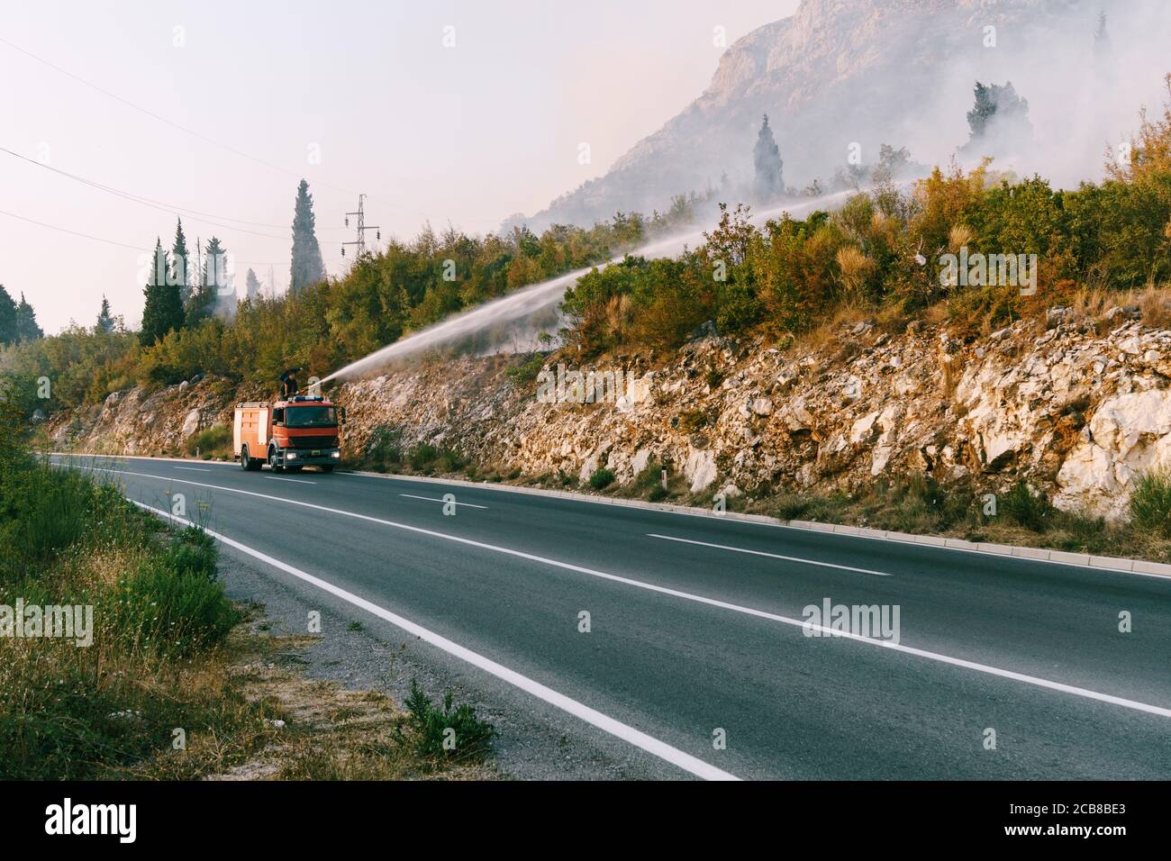 Forest fire on roadside hi-res stock photography and images - Alamy