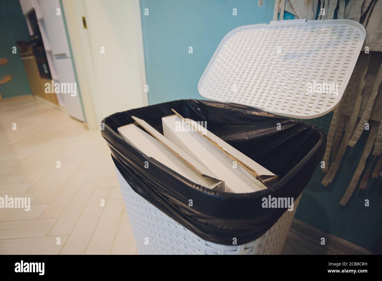 pizza boxes in the trash can at home Stock Photo - Alamy