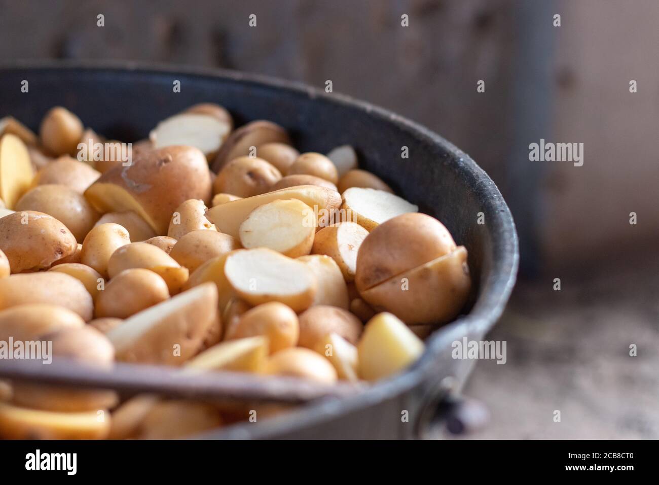 Potato halves being stored in buckets, village rural countryside life ...