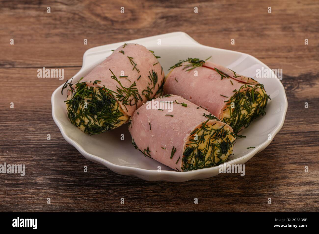Ham roll snack with cheese and garlic Stock Photo - Alamy