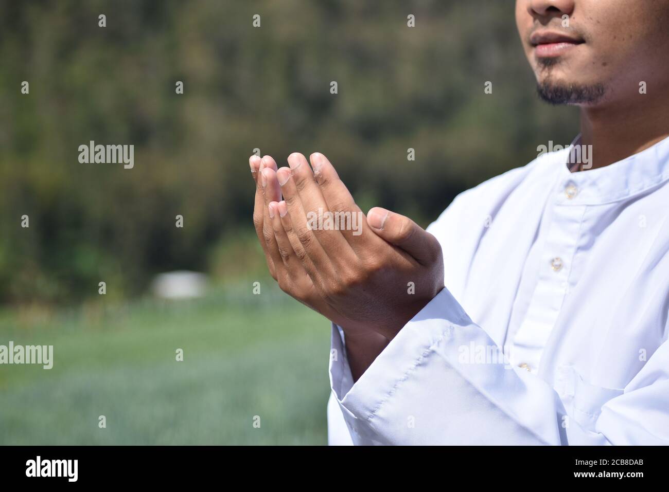 Hand of religious muslim praying Stock Photo - Alamy