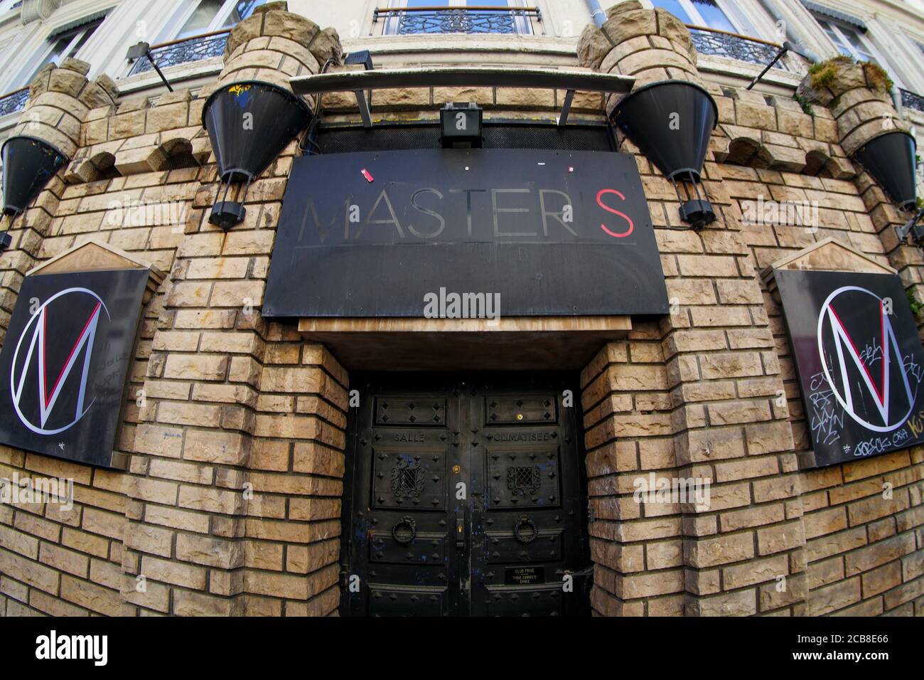 Middle-age looking facade of a Club called Master's, Perrache district ...
