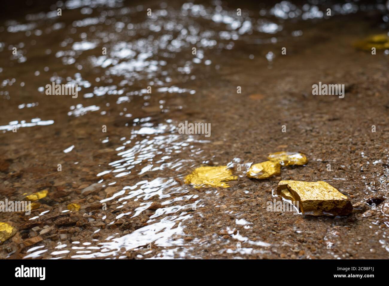 Gold ore in sand hi-res stock photography and images - Alamy