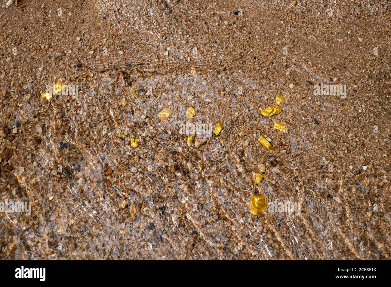 Gold ore in sand hi-res stock photography and images - Alamy