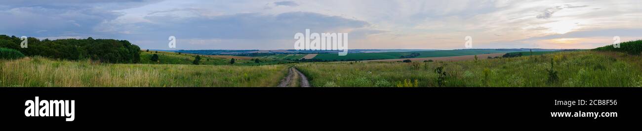 field and road - large horizontal panorama landscape Stock Photo - Alamy