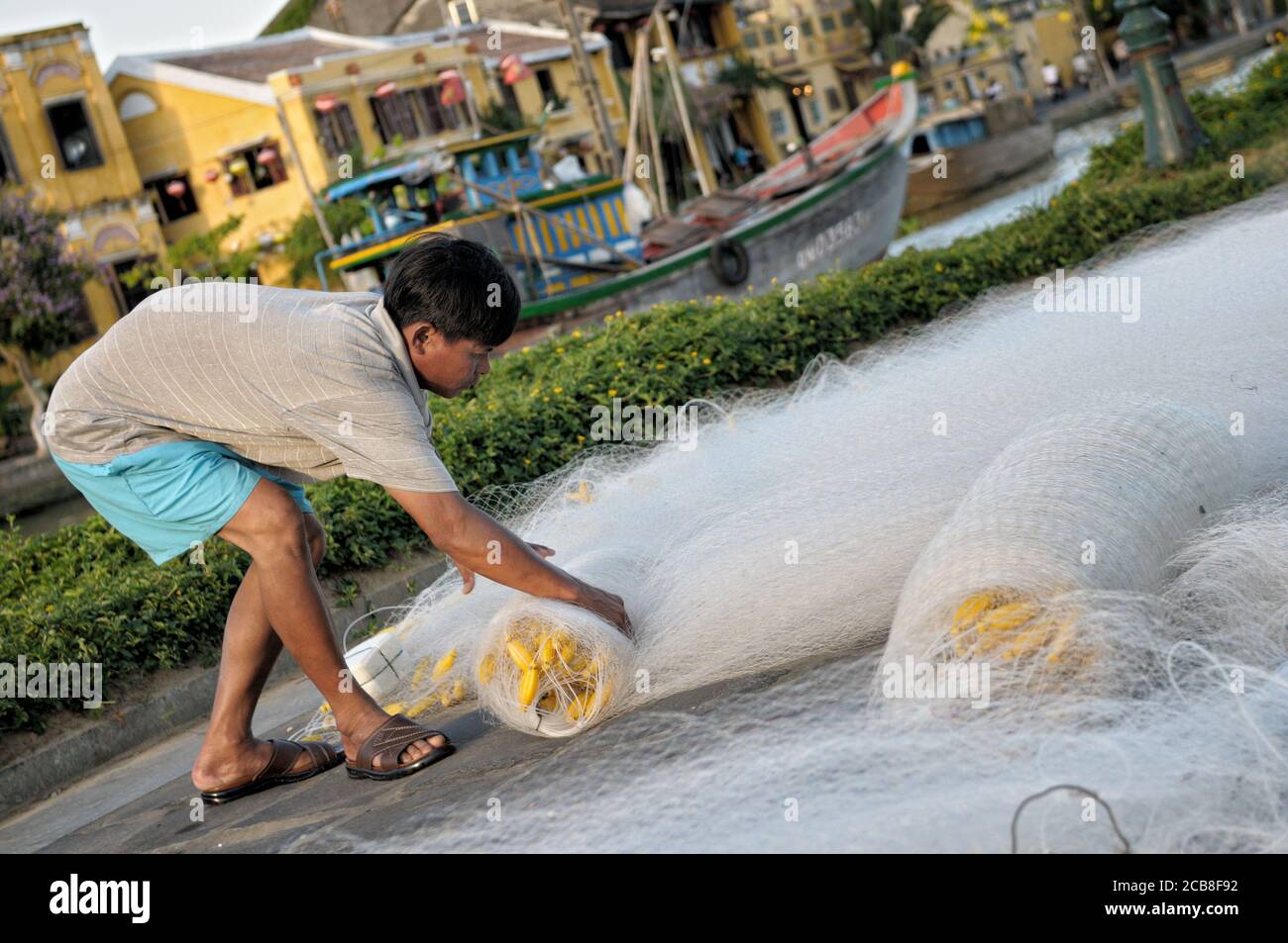 Male fishing nets hi-res stock photography and images - Alamy