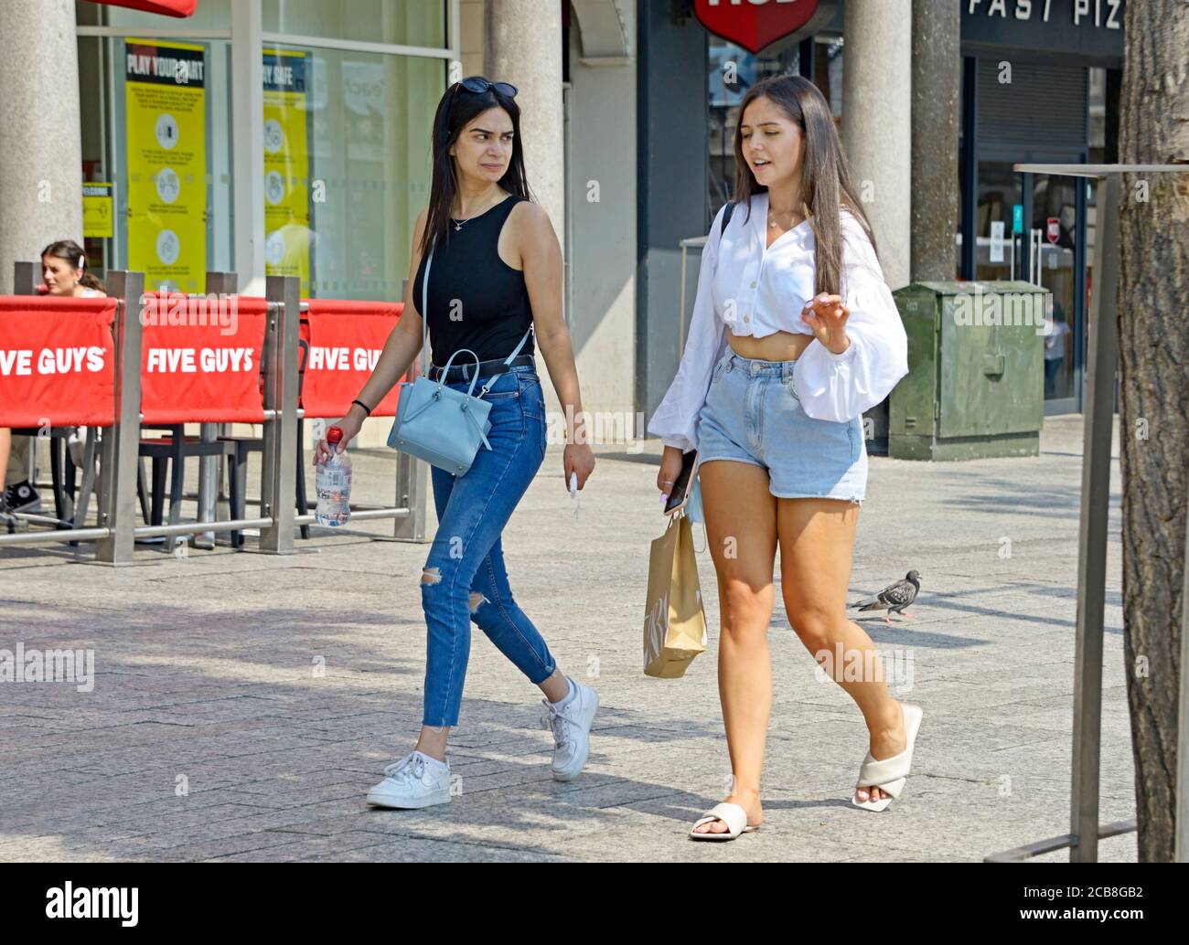 Attractive girls out shopping, post lockdown Stock Photo - Alamy