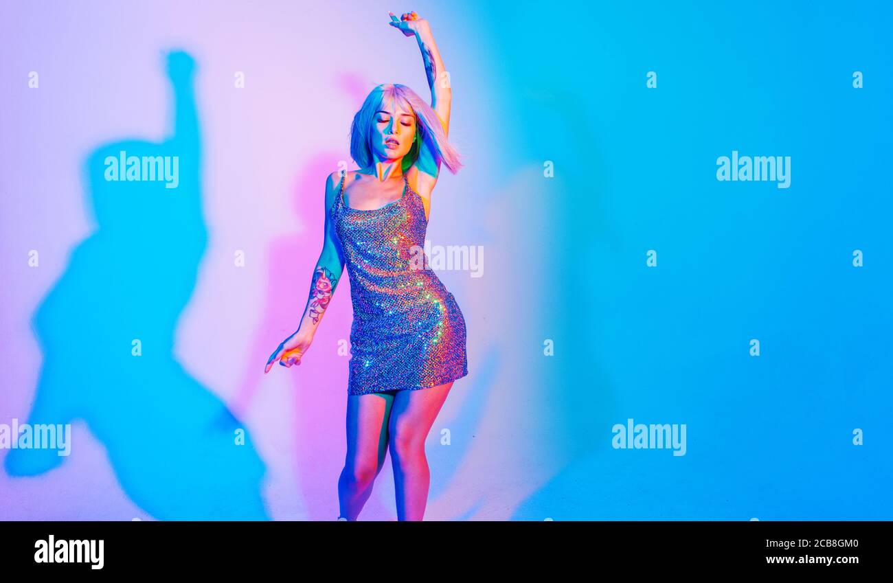 Fashion portrait of beautiful woman on colored background Stock Photo ...