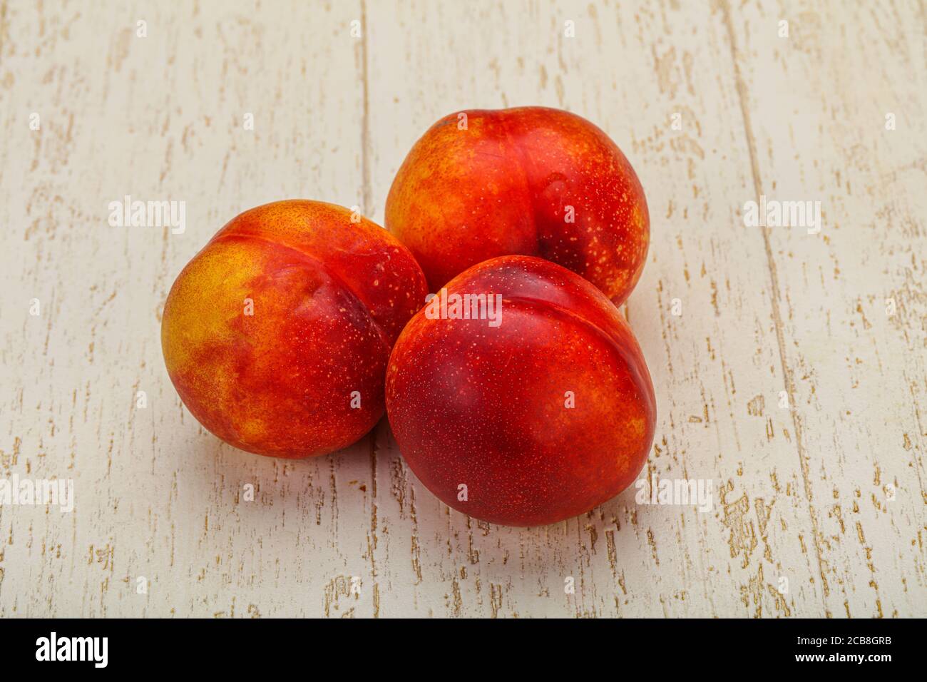 Ripe sweet tasty red Nectarine fruit Stock Photo - Alamy