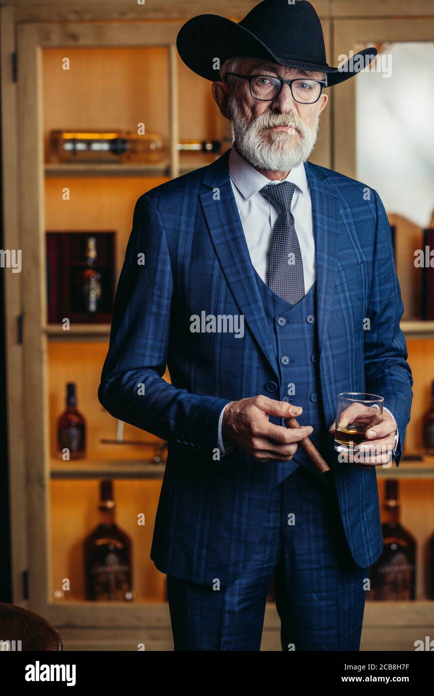 Portrait of old-aged male dandy dressed in elegant trendy men s suit in ...