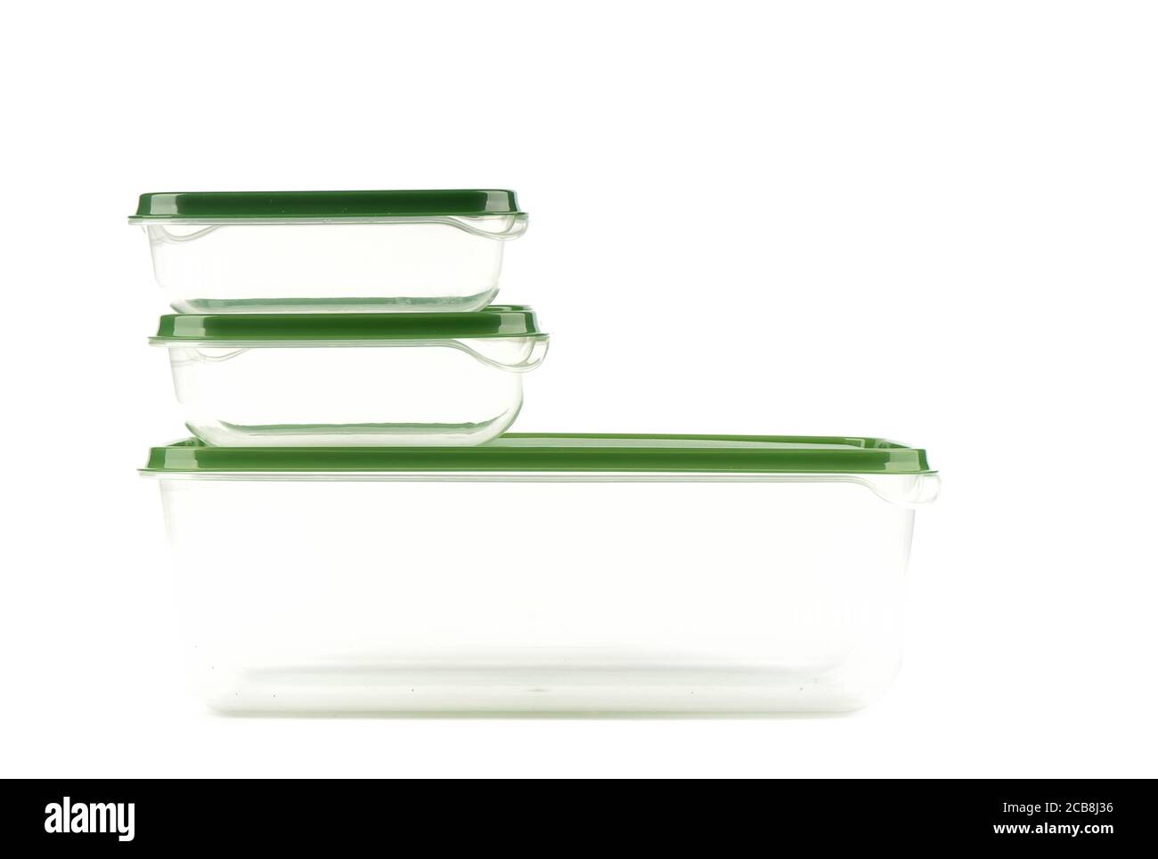 Different plastic containers with a green lid for storing food ...