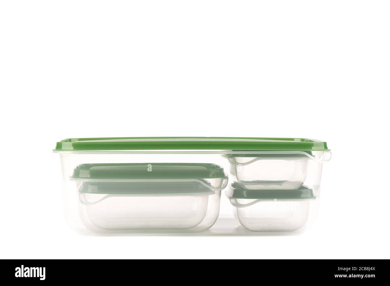 Small plastic containers for storing food inside a large one isolated ...