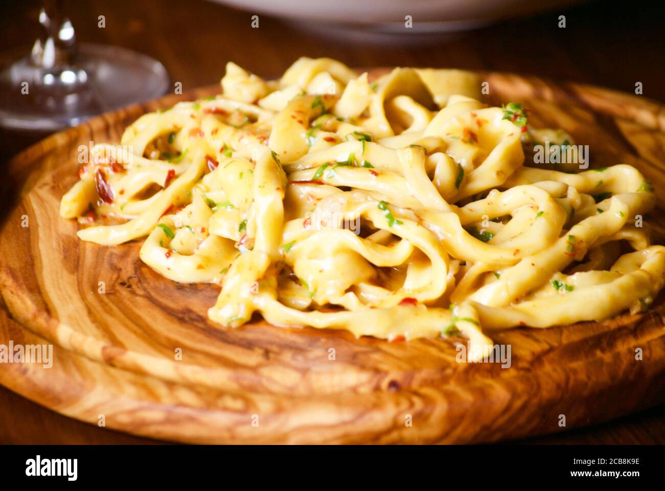 one continuous noodle Stock Photo - Alamy