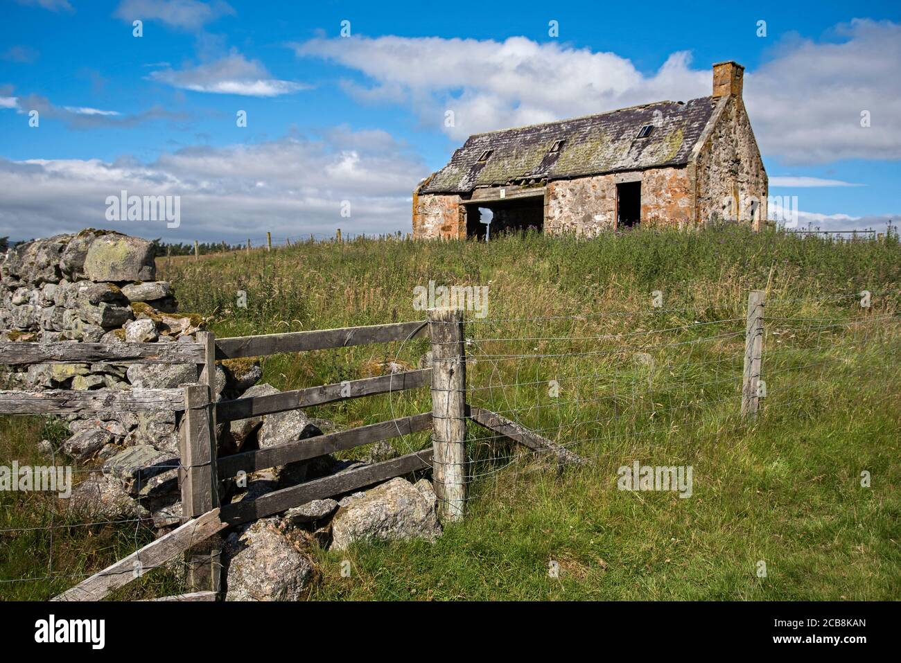 Ruins of a cottage on a hillside near Ruthven in Cairngorms National ...