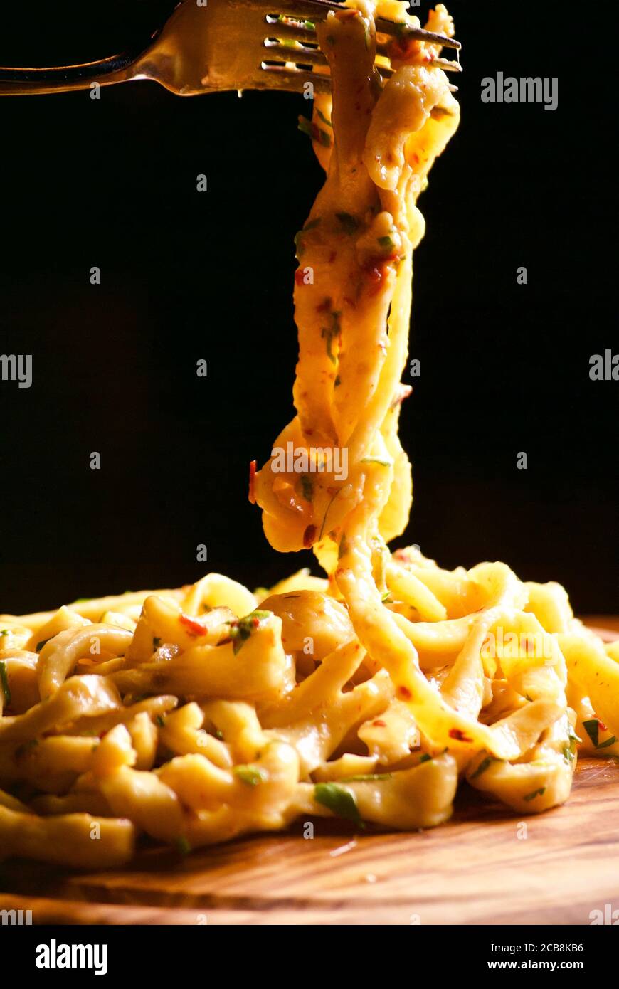 one continuous noodle Stock Photo - Alamy