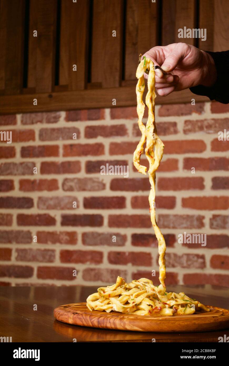 one continuous noodle Stock Photo - Alamy