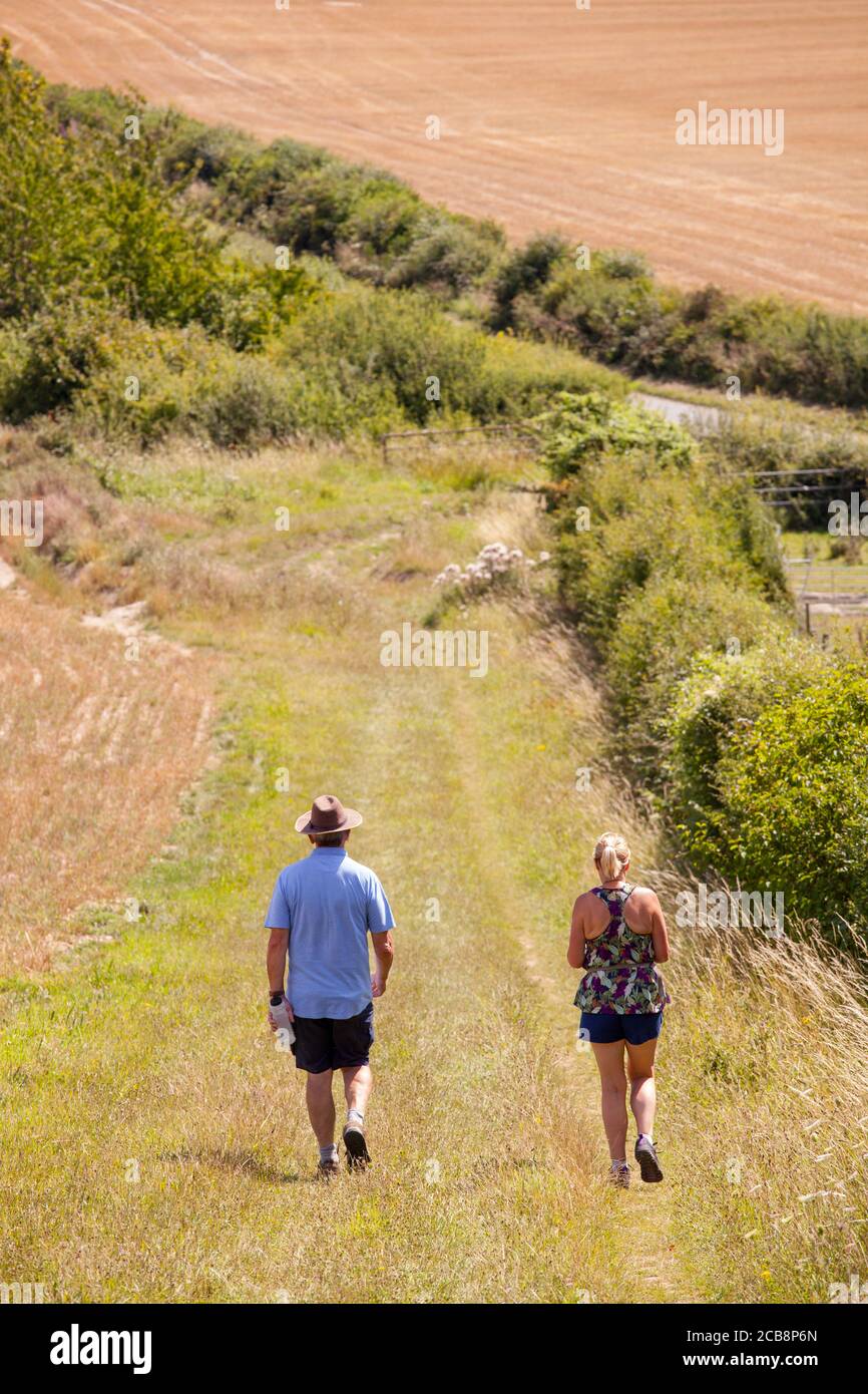 People walking at Ewelme Oxfordshire on the Chiltern way long distance ...