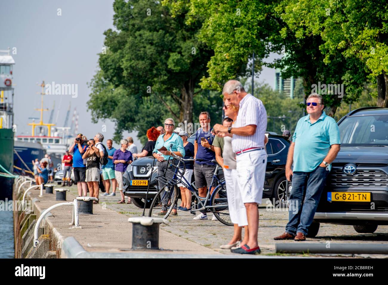 people watching the cruise ship.The MS Rotterdam, a Holland-America ...