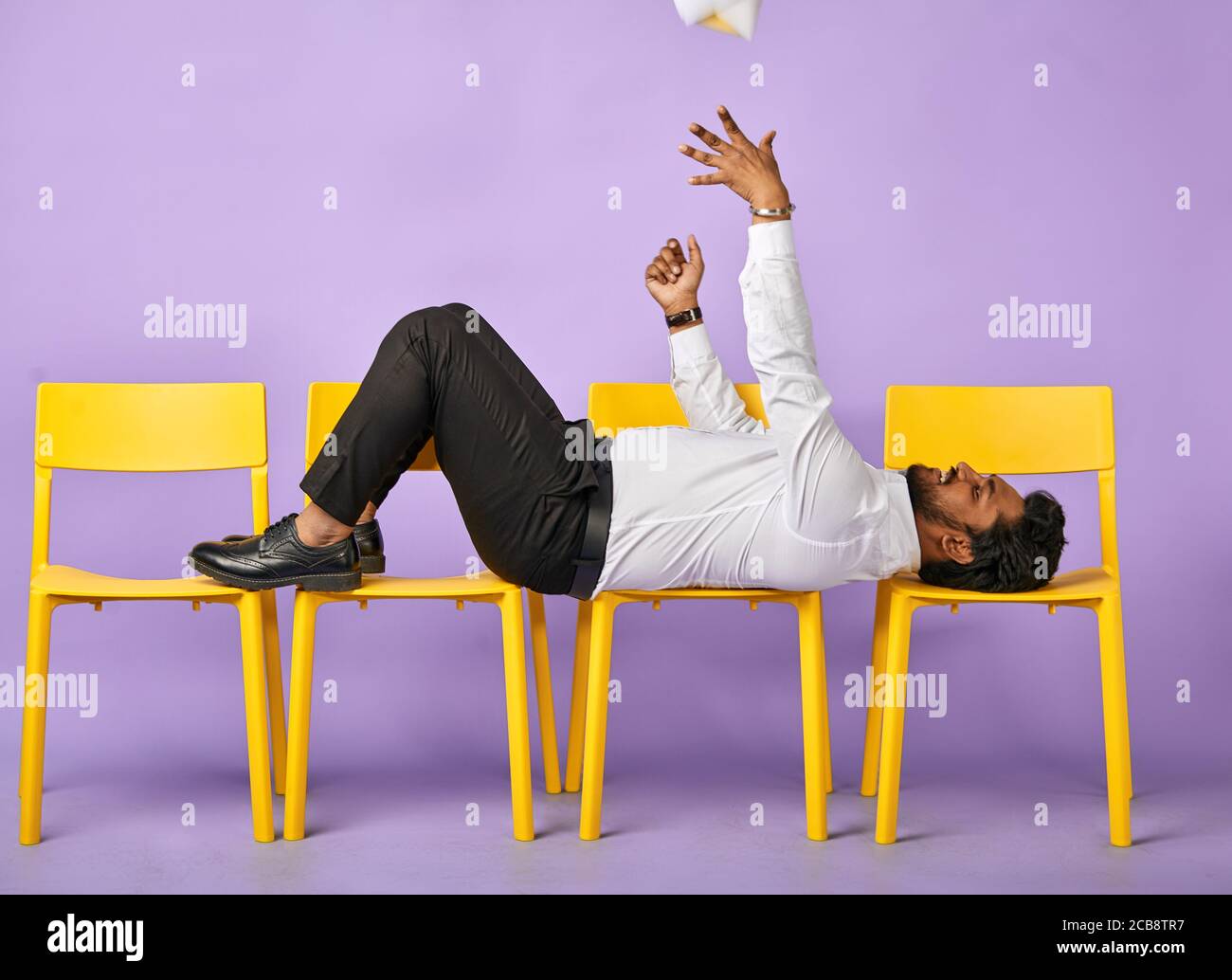 Man throwing chair hi-res stock photography and images - Alamy