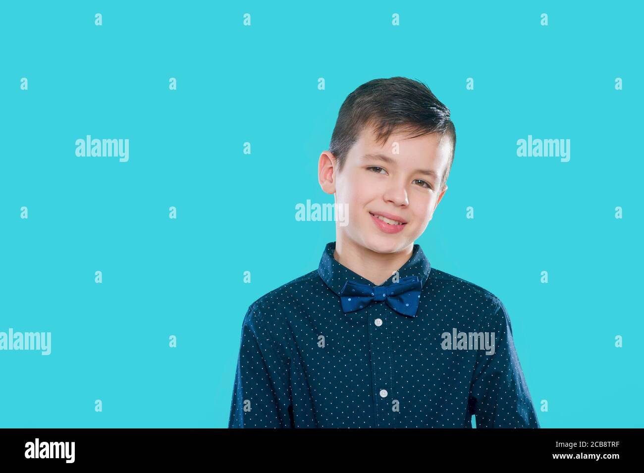 Pretty boy posing at studio as a fashion model. Studio portrait Stock ...