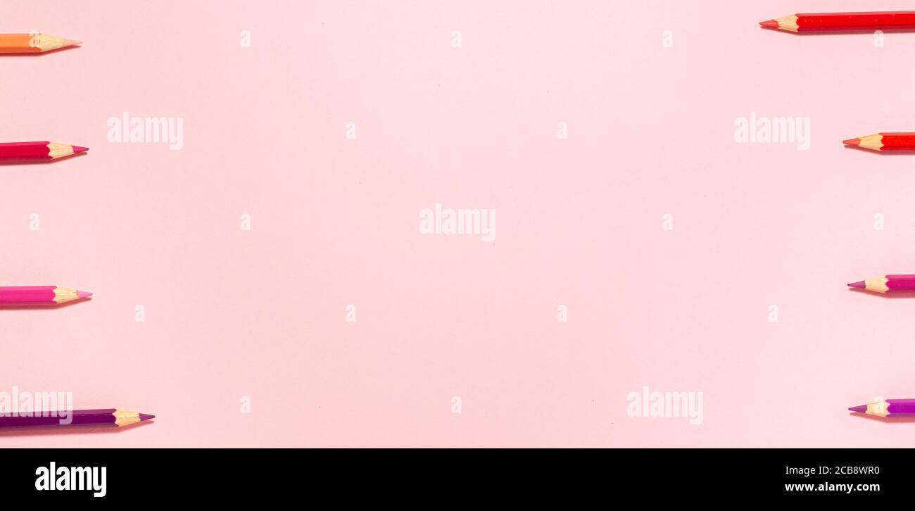 Banner of red, pink, purple, and orange pencils move forward two at ...