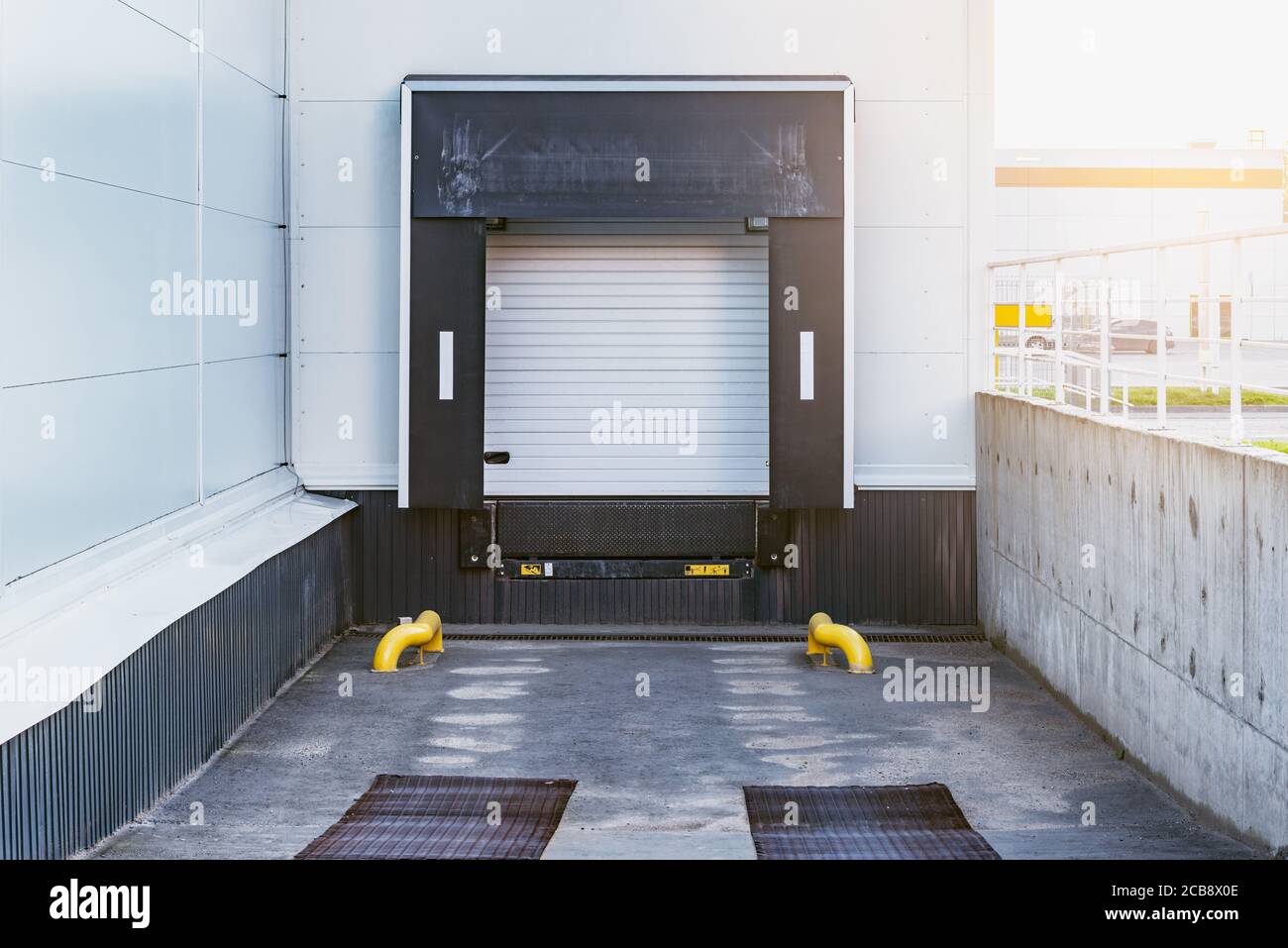 Door of the supermarket storage at evening time Stock Photo - Alamy