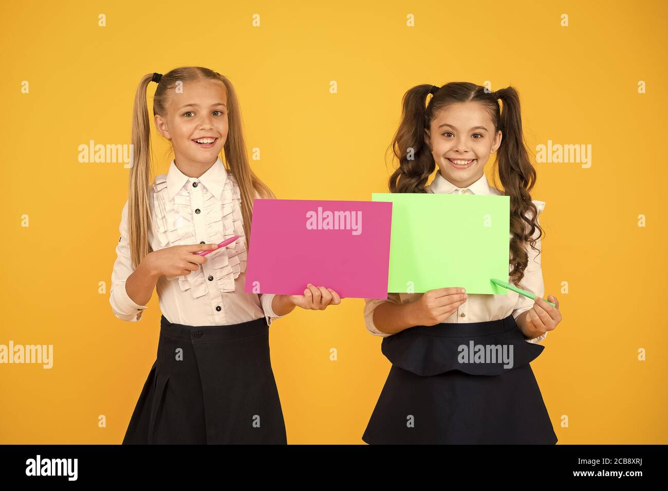 Girls school uniform hold poster. Visual communication concept. School ...