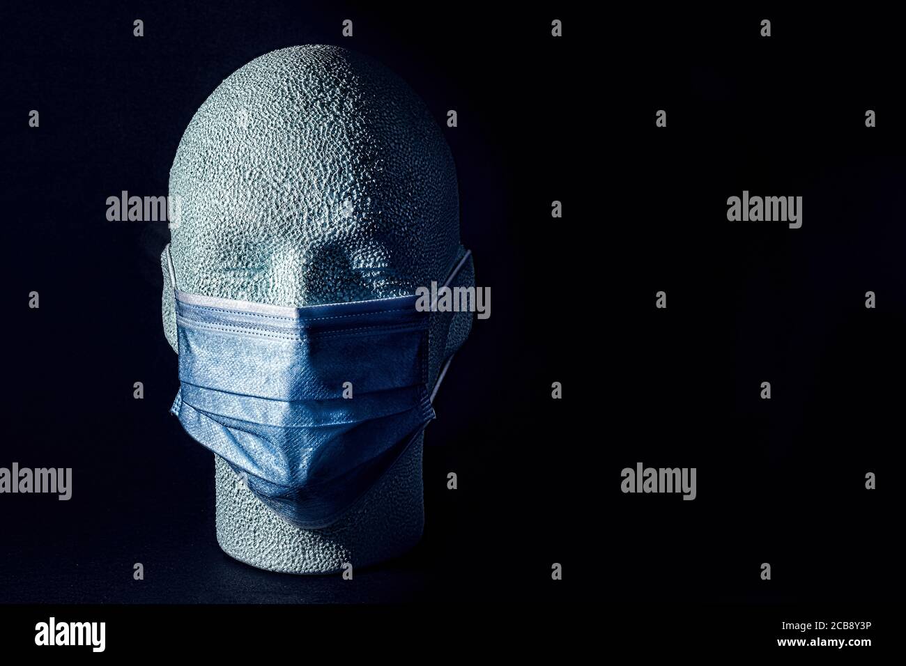 Wearing is caring. Styrofoam human head with face mask . COVID-19 Stock ...